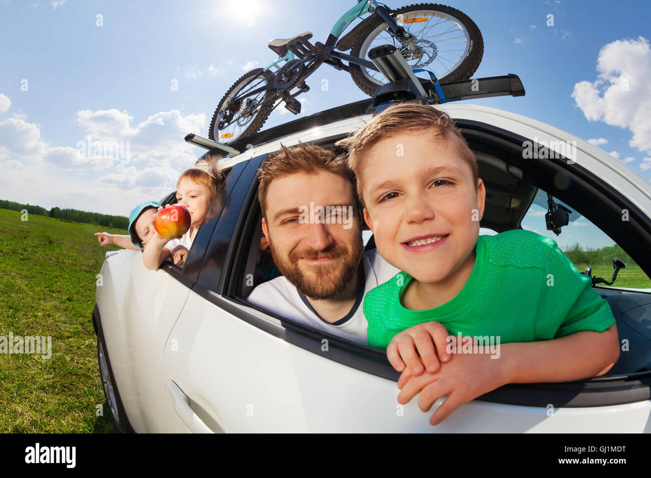 Big happy family going on holiday trip in summer Stock Photo - Alamy