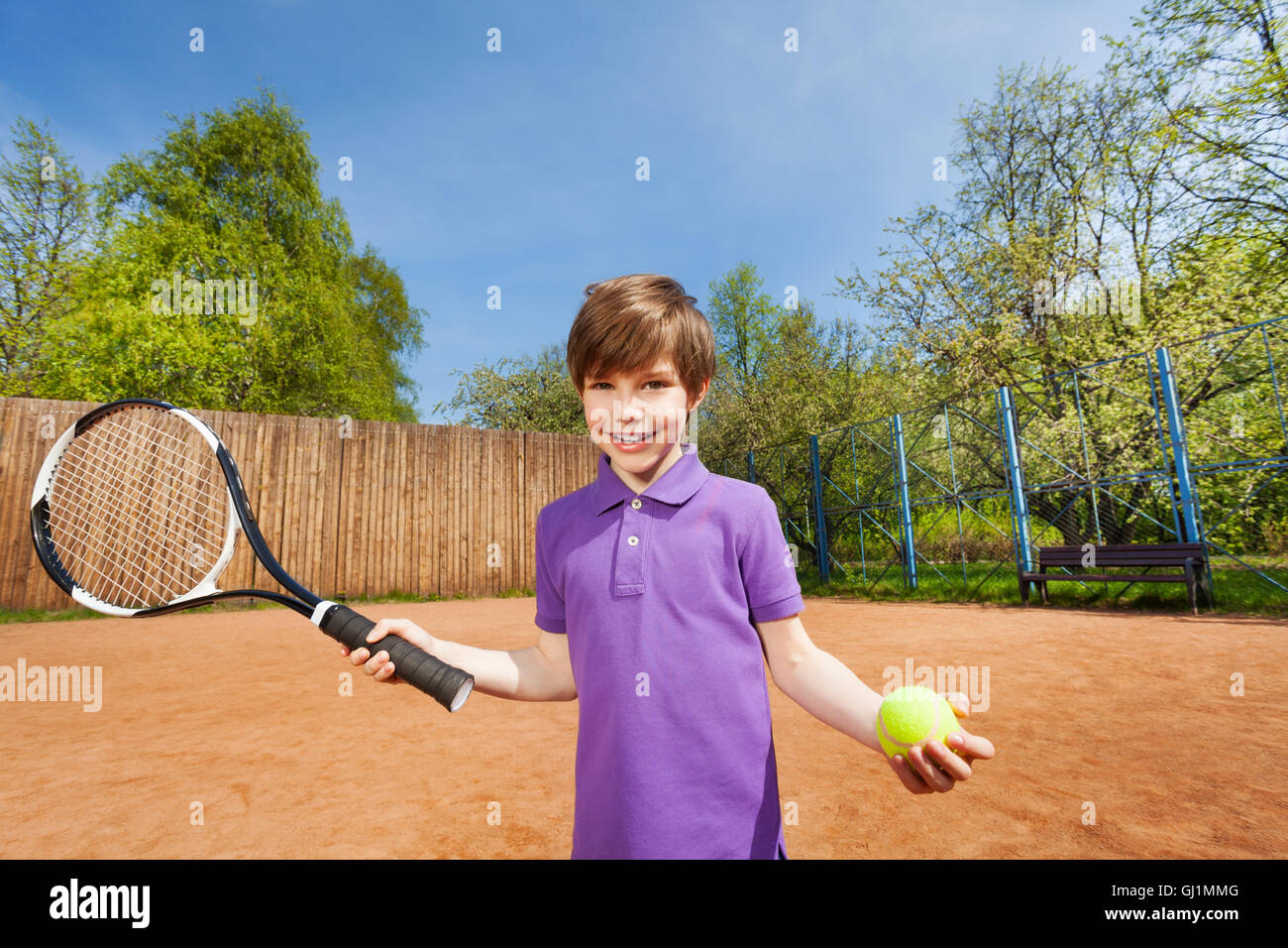 Kids playing tennis hi-res stock photography and images - Alamy
