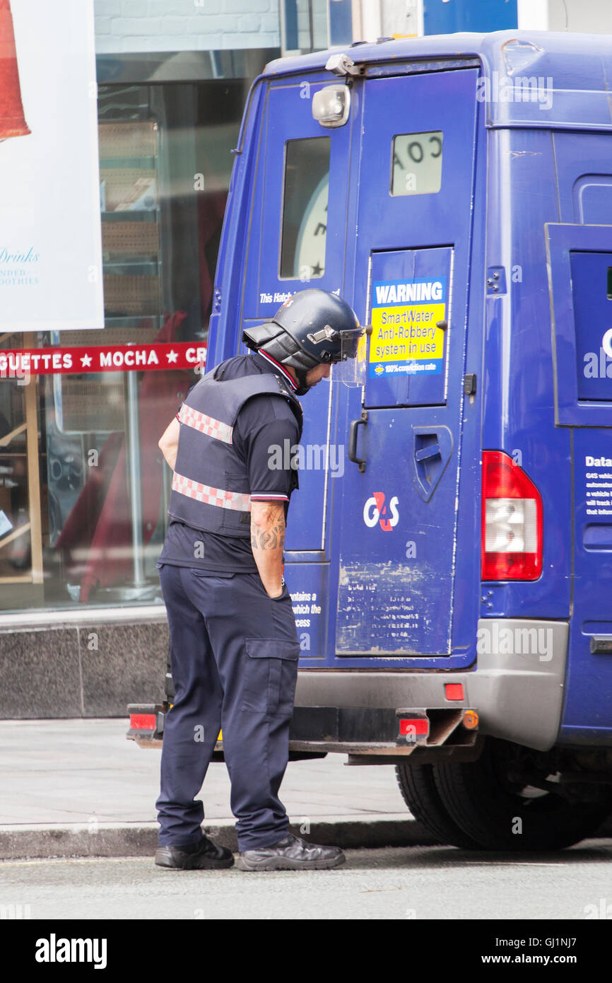 Secuirty Guard cash collection in Liverpool One, Merseyside, UK Stock ...