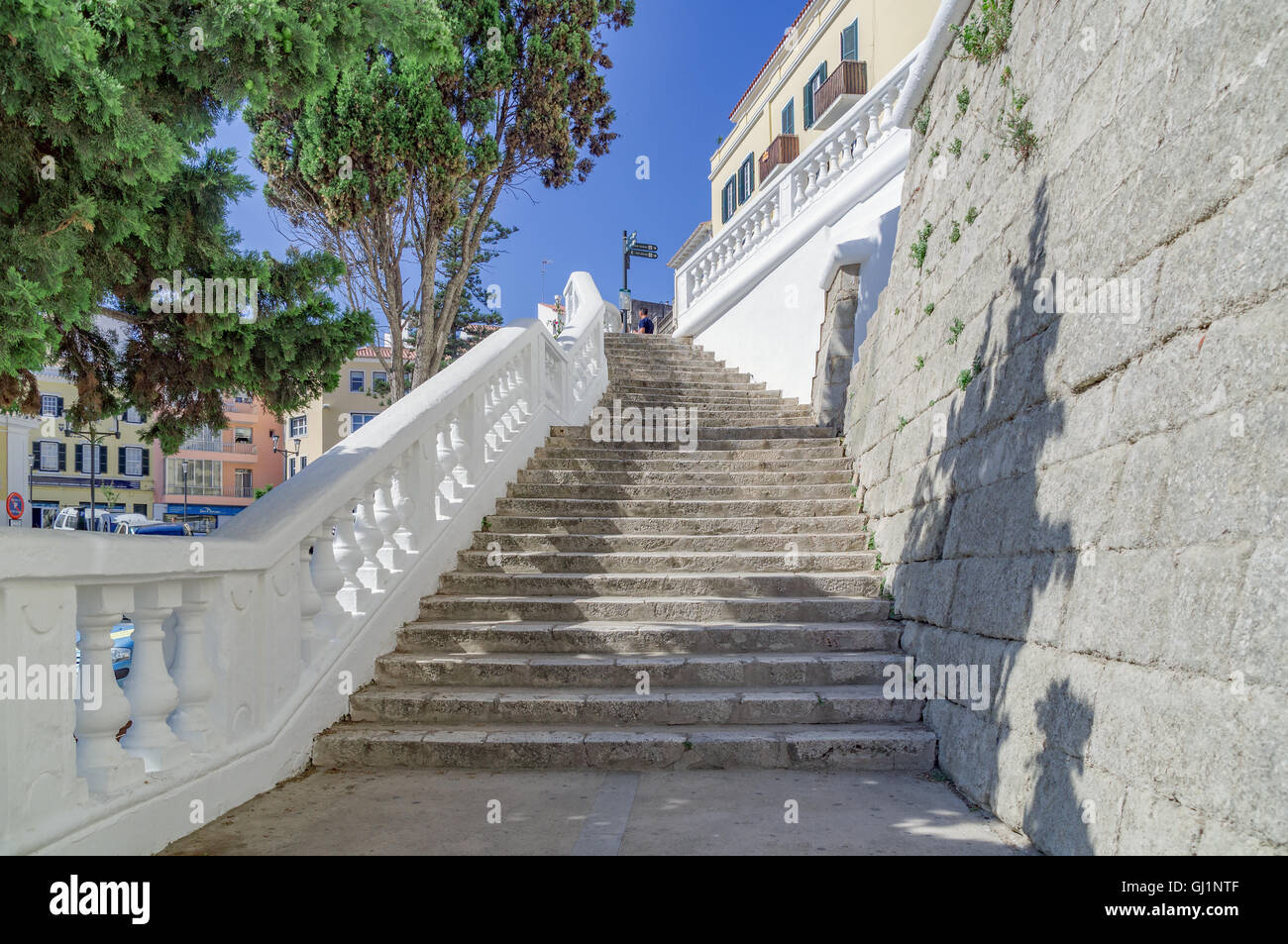 The streets and lanes of the Menorcan capital of Mahon in Spain. Steps ...