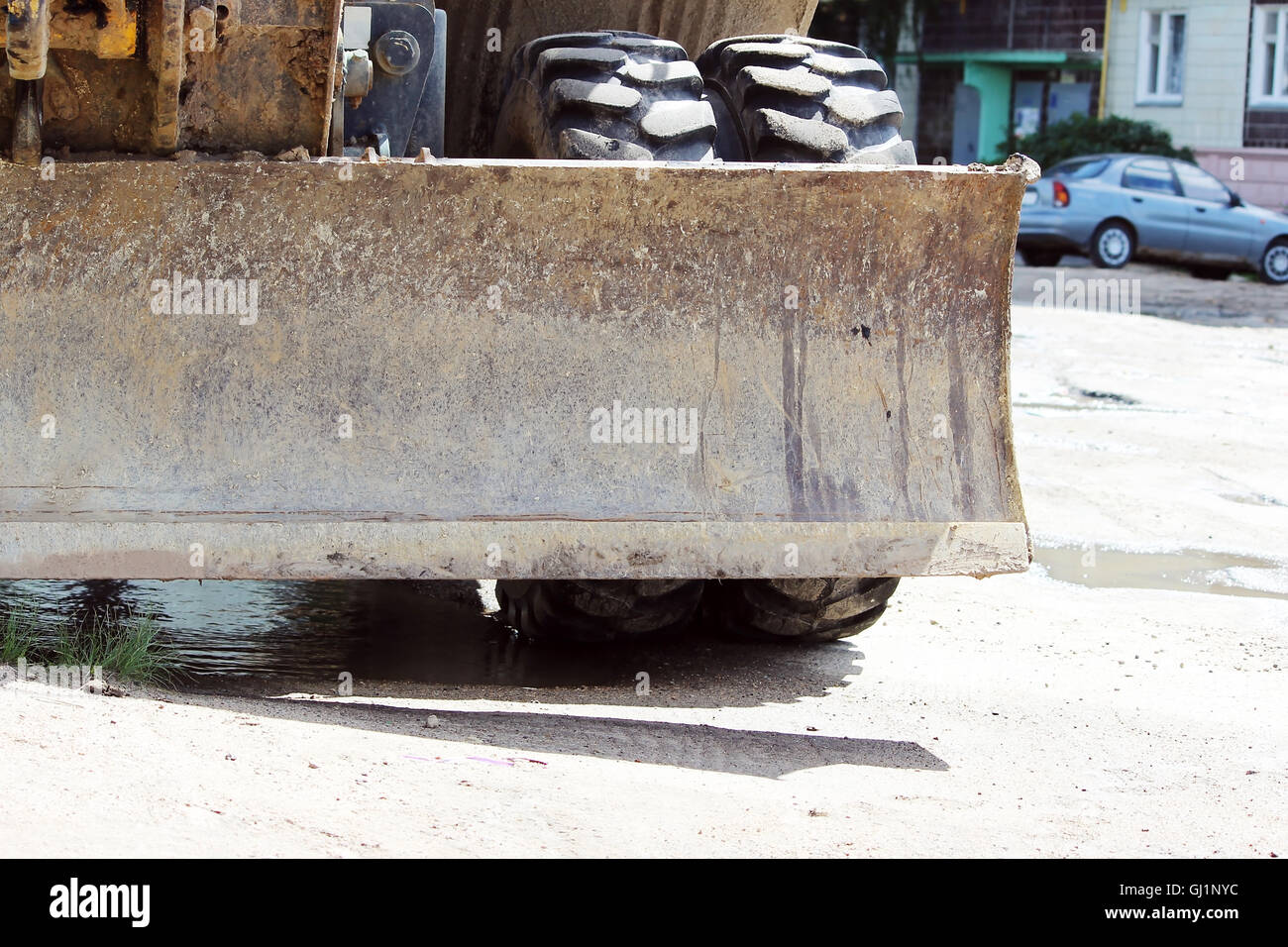 blade in the bulldozer and ground for construction work on the road ...