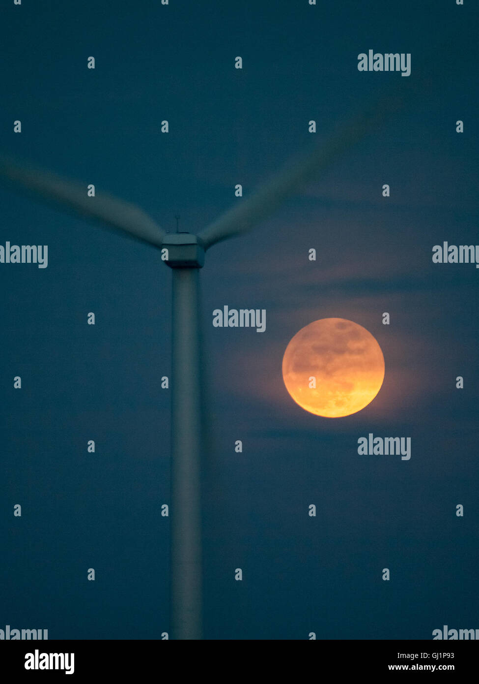 Wind Turbine and Full Moon Stock Photo - Alamy