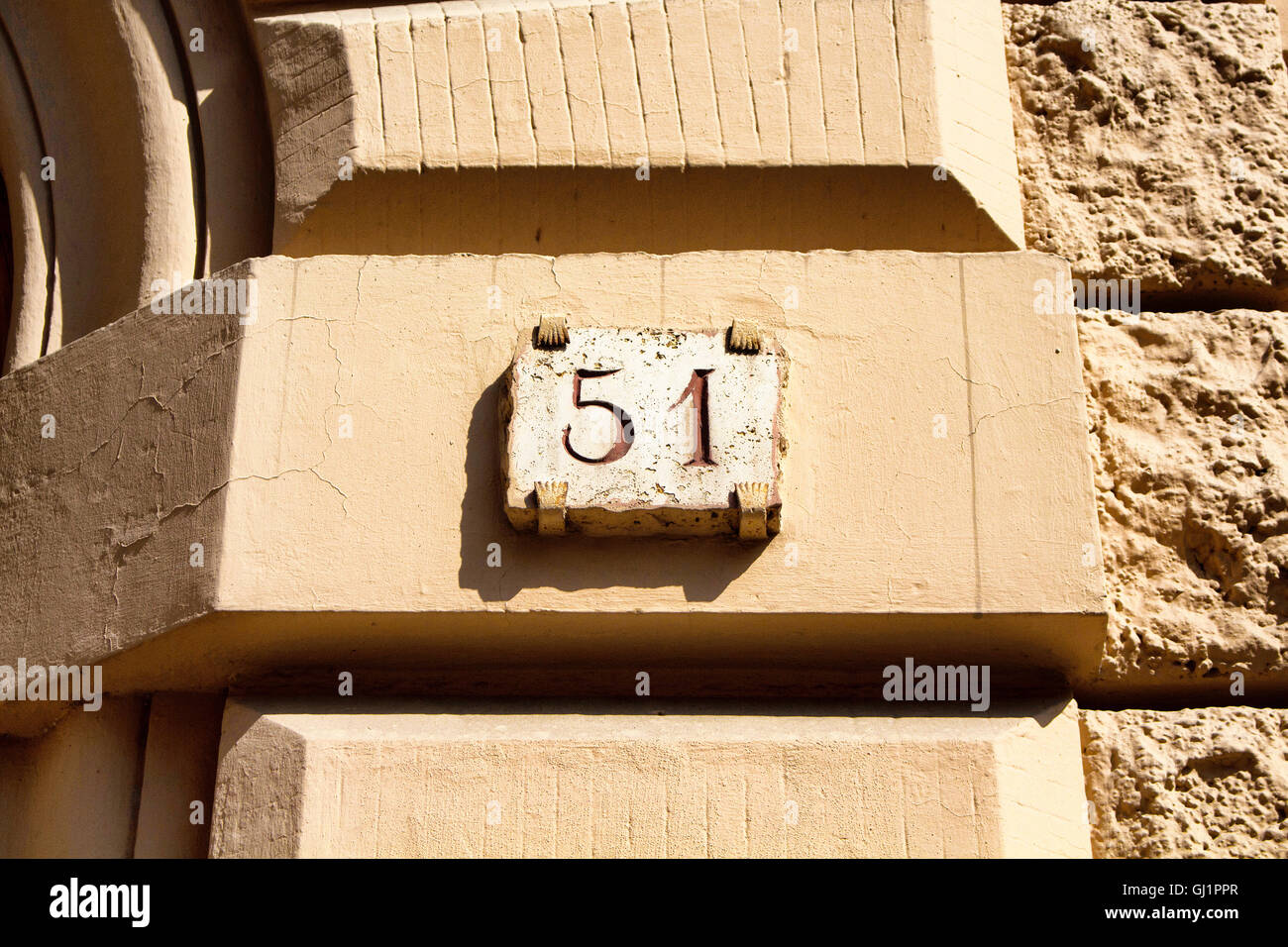 Engraved building number in Rome Stock Photo - Alamy