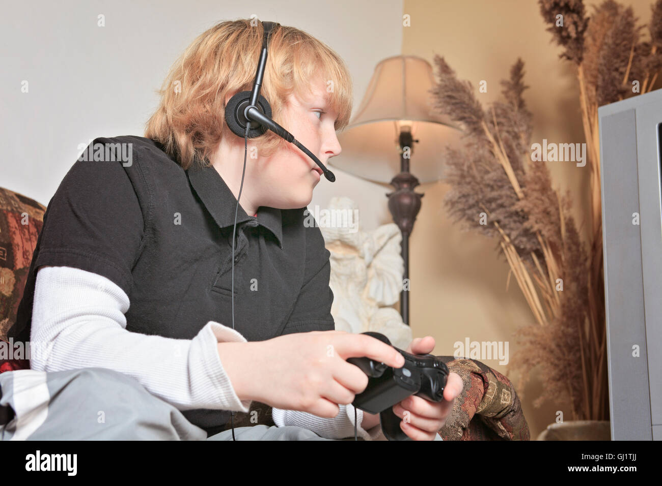 A teen with video game addiction problem Stock Photo - Alamy