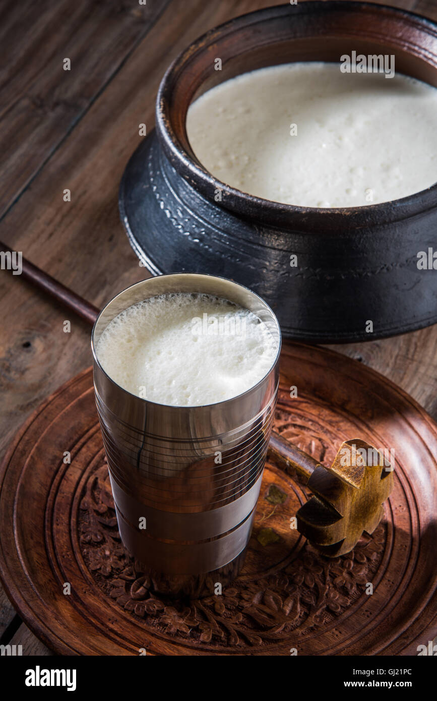 Indian sweet Lassi made up of milk, curd, sugar and salt mixed with ice ...