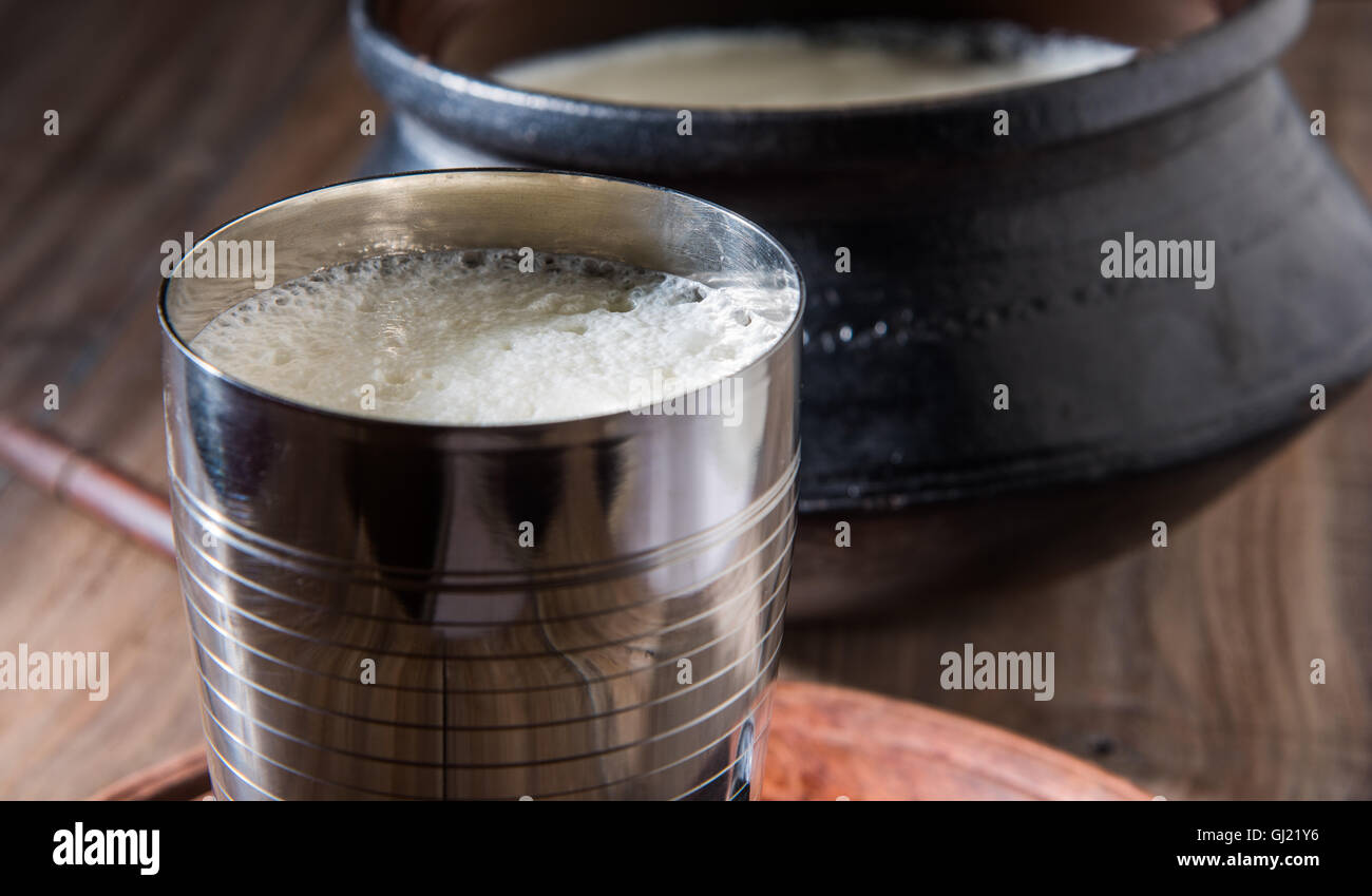 Indian sweet Lassi made up of milk, curd, sugar and salt mixed with ice ...