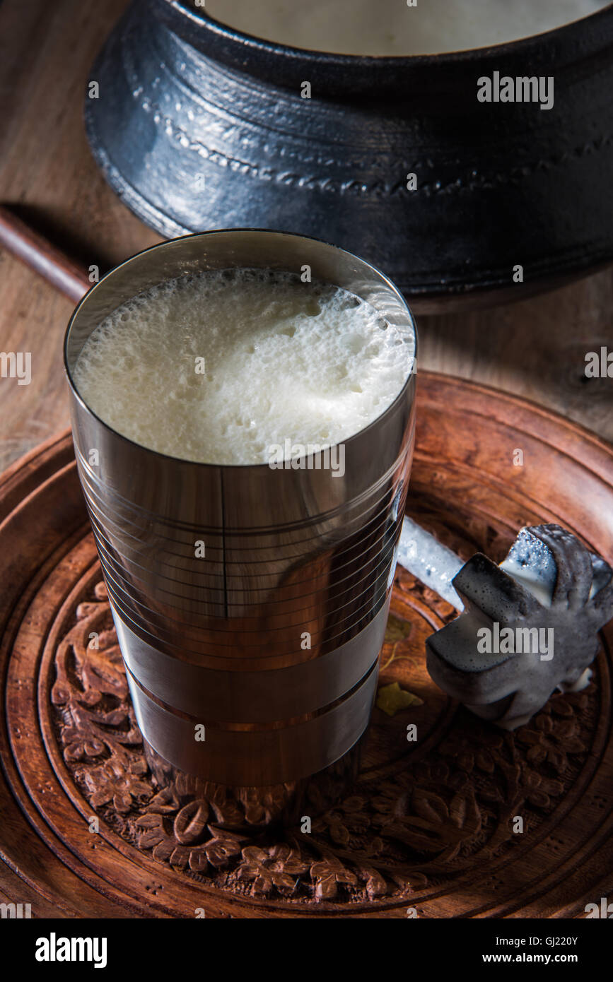 Indian sweet Lassi made up of milk, curd, sugar and salt mixed with ice ...