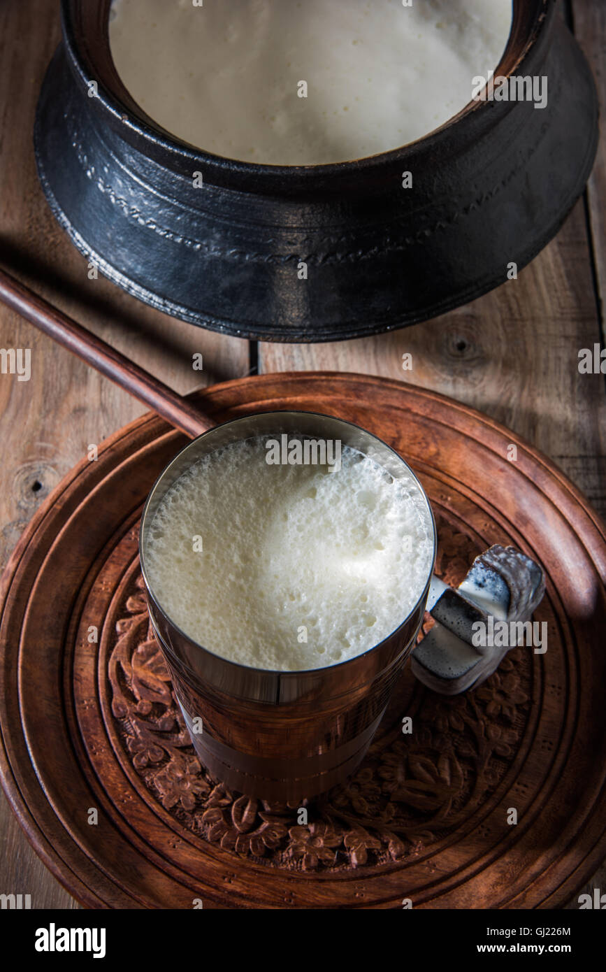 Indian sweet Lassi made up of milk, curd, sugar and salt mixed with ice ...