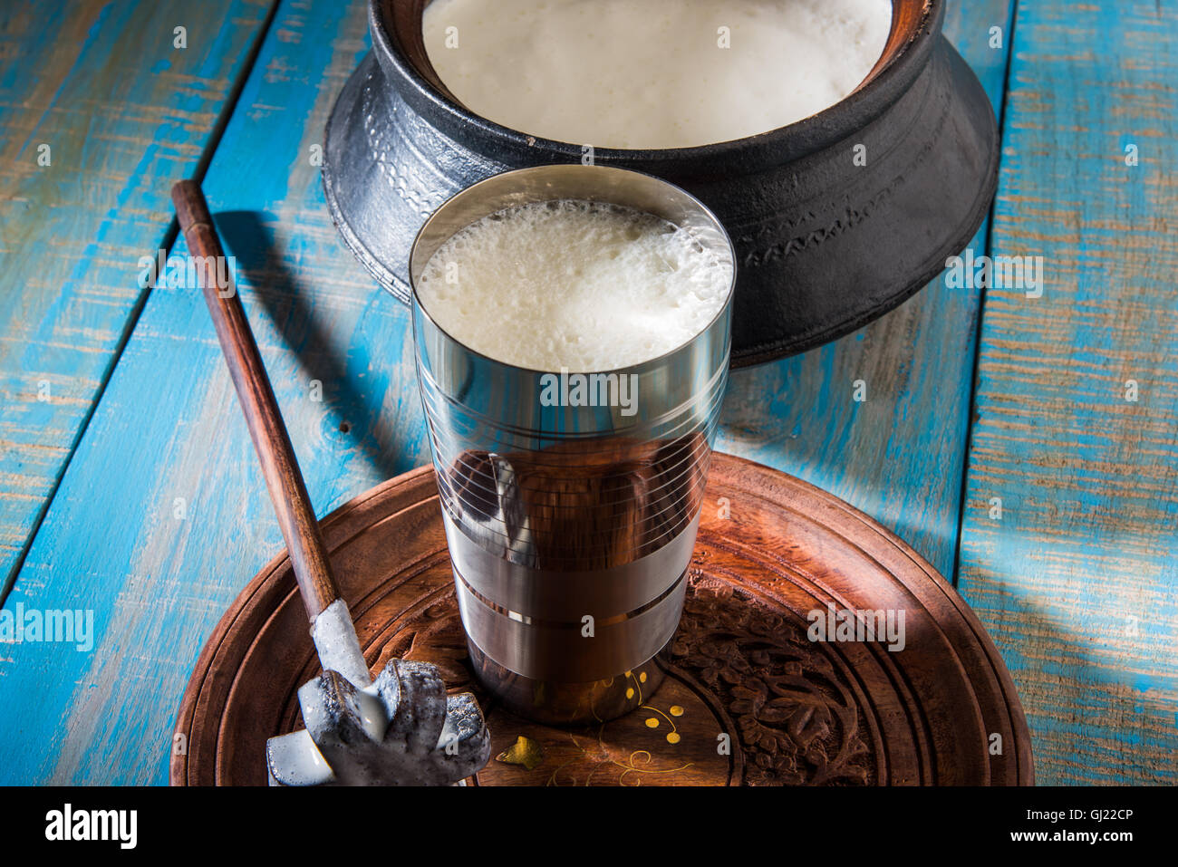 Indian sweet Lassi made up of milk, curd, sugar and salt mixed with ice ...