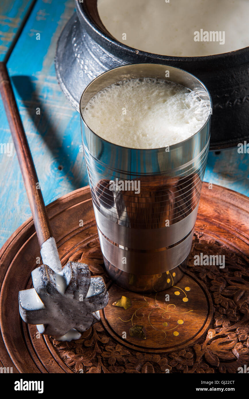 Indian sweet Lassi made up of milk, curd, sugar and salt mixed with ice ...