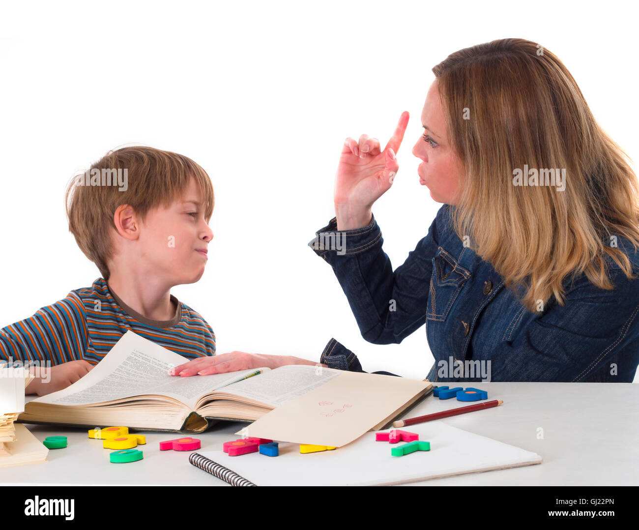 mother teaching her son Stock Photo - Alamy