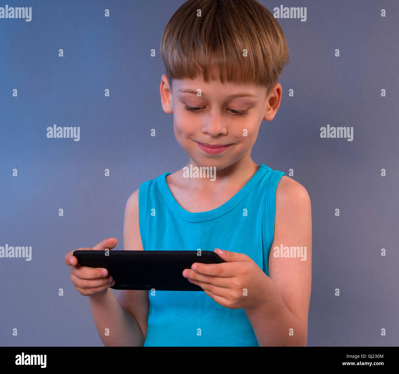 boy playing video games Stock Photo - Alamy
