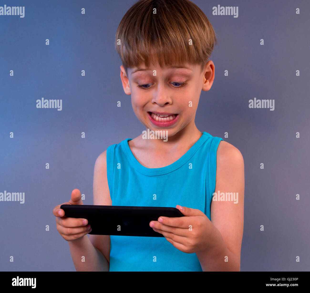 boy playing video games Stock Photo - Alamy