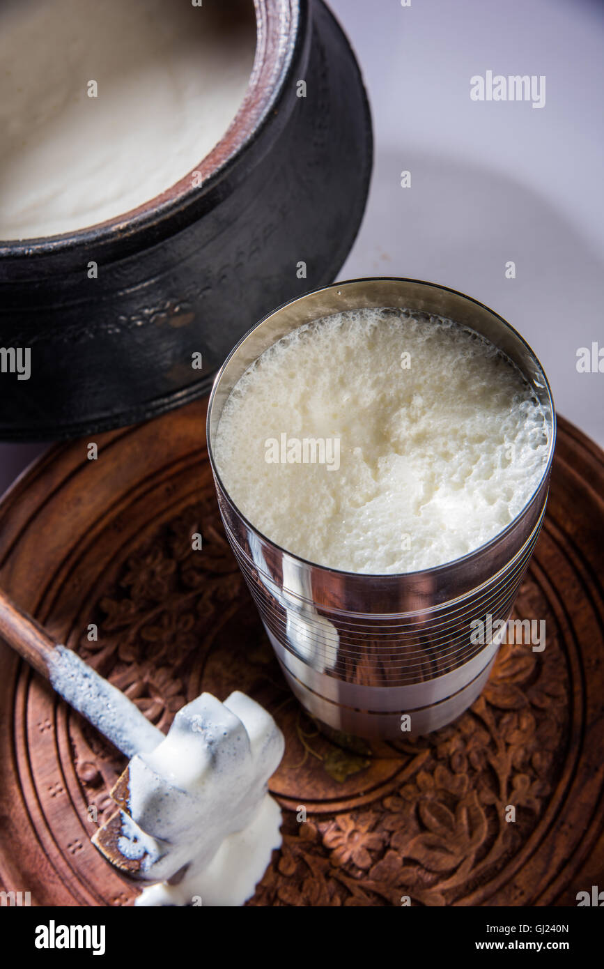Indian sweet Lassi made up of milk, curd, sugar and salt mixed with ice ...