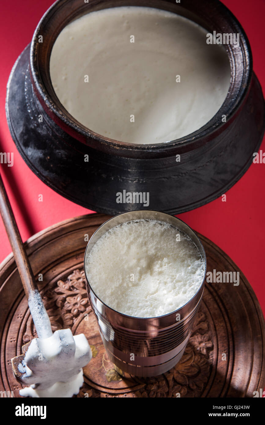 Indian sweet Lassi made up of milk, curd, sugar and salt mixed with ice ...