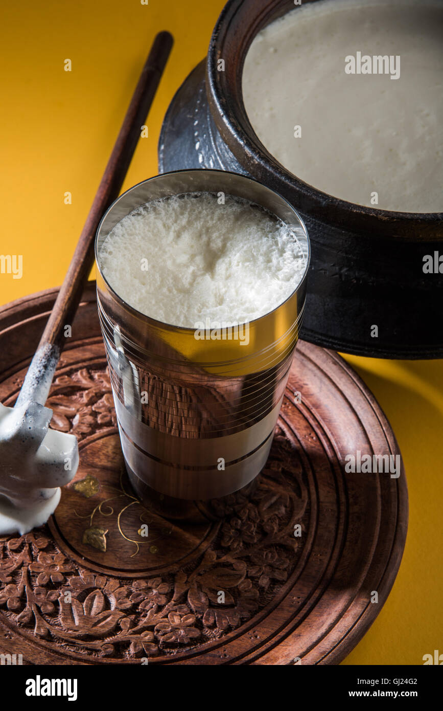 Indian sweet Lassi made up of milk, curd, sugar and salt mixed with ice ...
