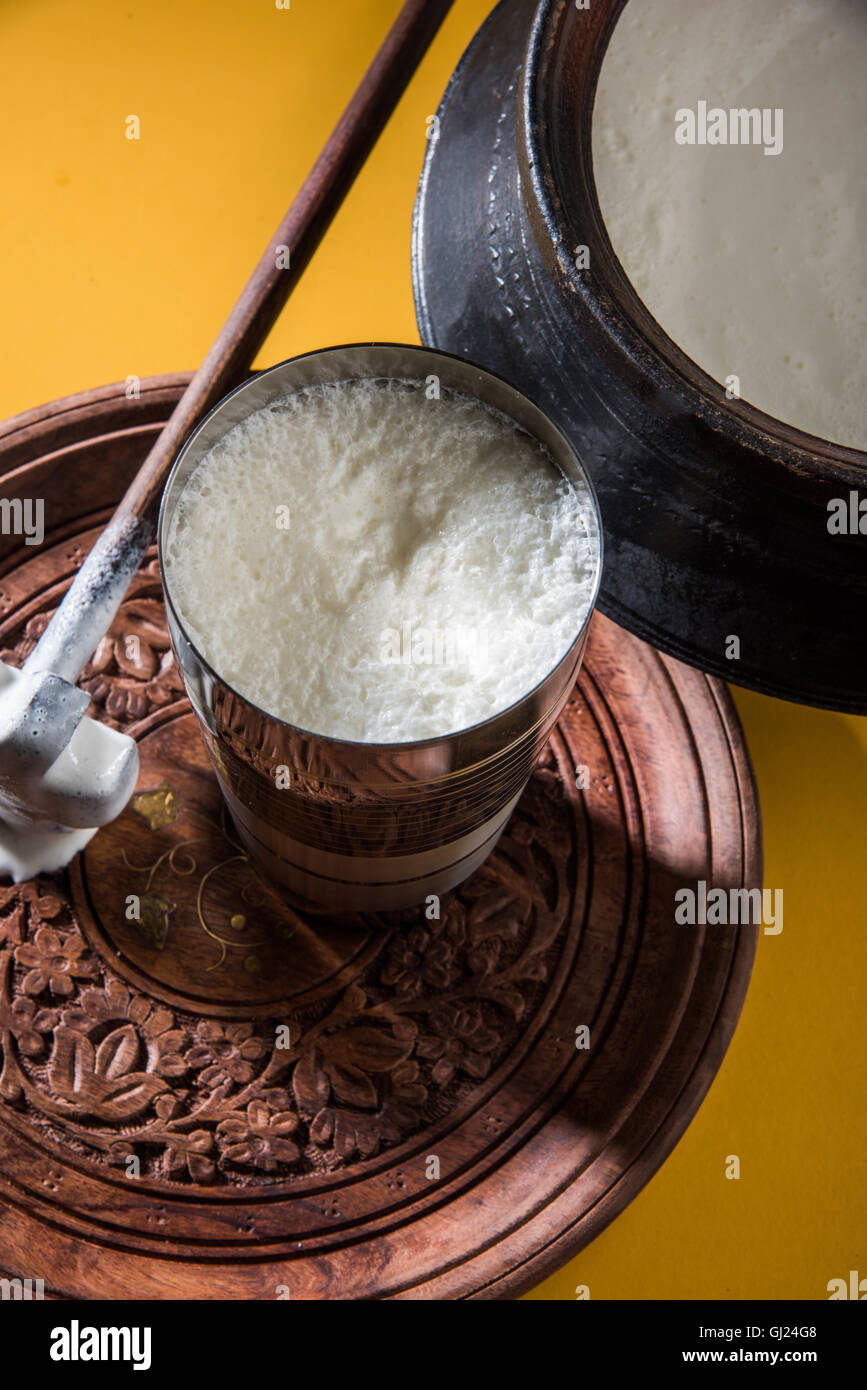 Indian sweet Lassi made up of milk, curd, sugar and salt mixed with ice ...