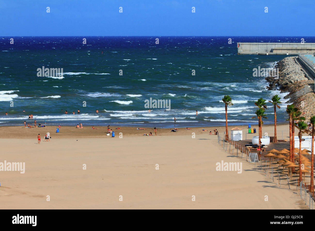 Sandy beach and storming sea. Valencia, Spain Stock Photo - Alamy
