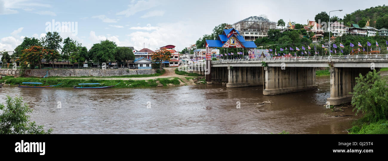 Chiang Rai, Thailand, Panoramic landscape views of bridge over flowing ...