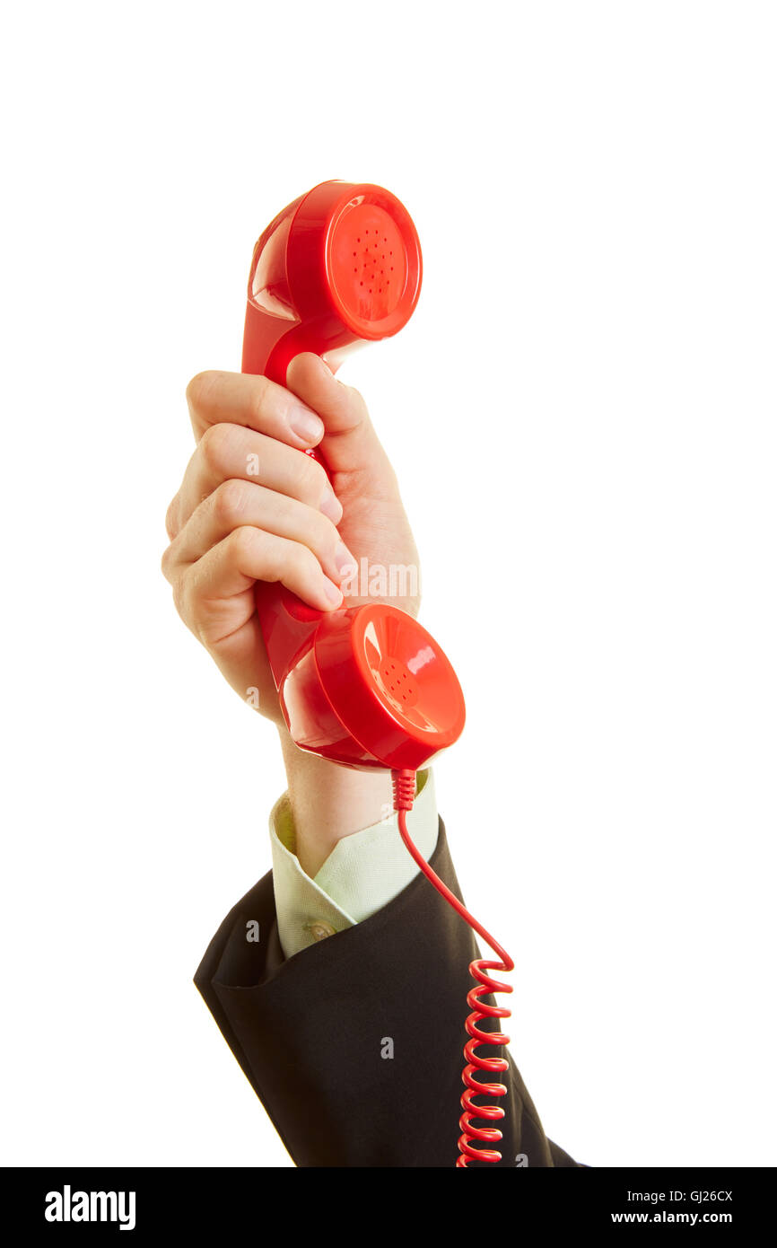 Hand holding landline phone hi-res stock photography and images - Alamy