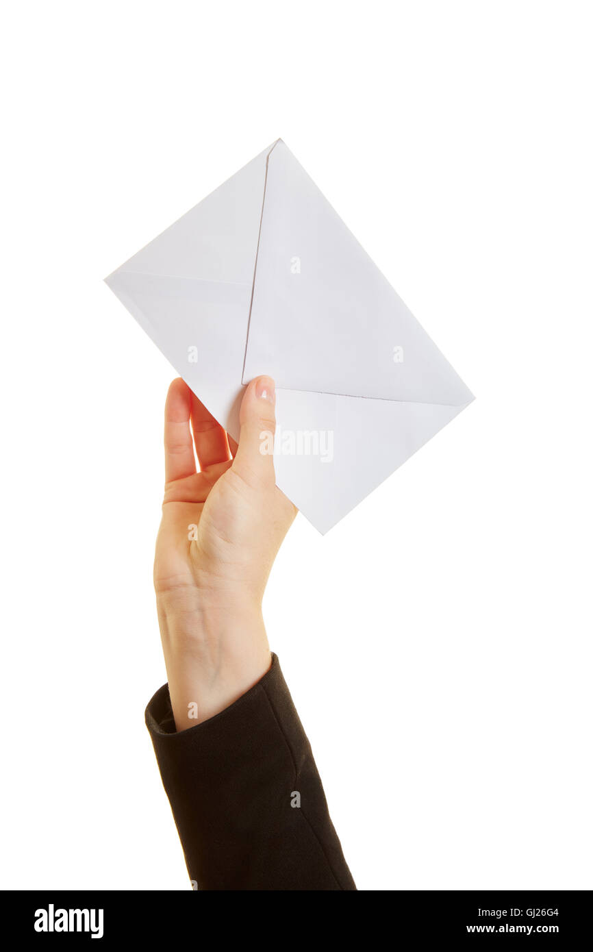 Hand holding a white envelope of a letter in the air Stock Photo - Alamy