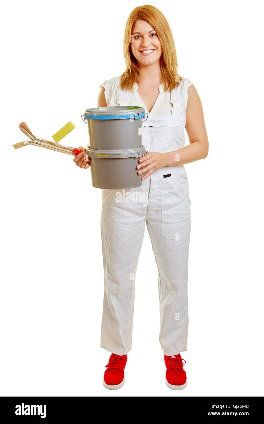 Female paintor smiling and holding paint buckets on a white background ...