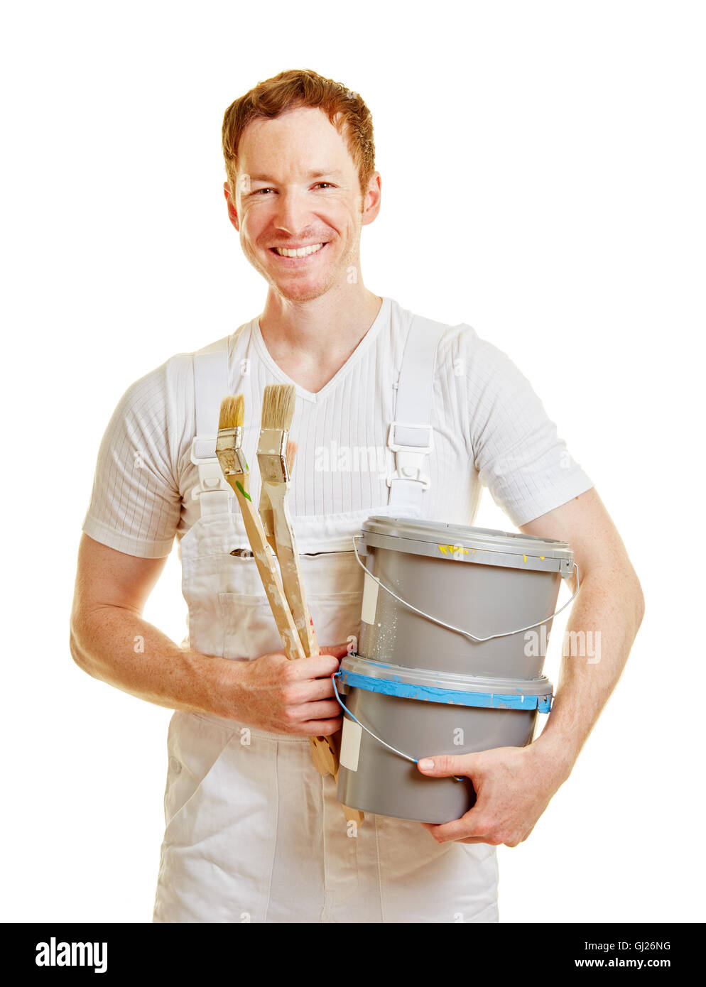 Smiling painter with paint buckets Stock Photo - Alamy