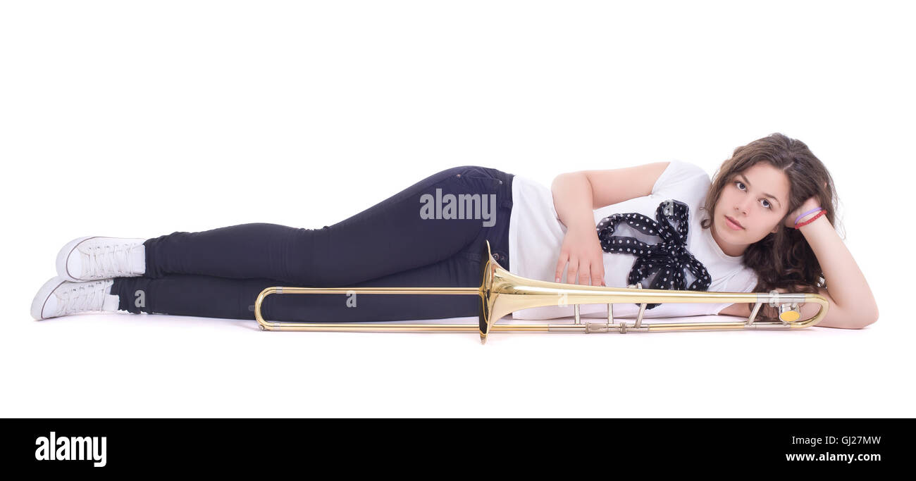 Teenage girl with trombone. Studio shot Stock Photo - Alamy