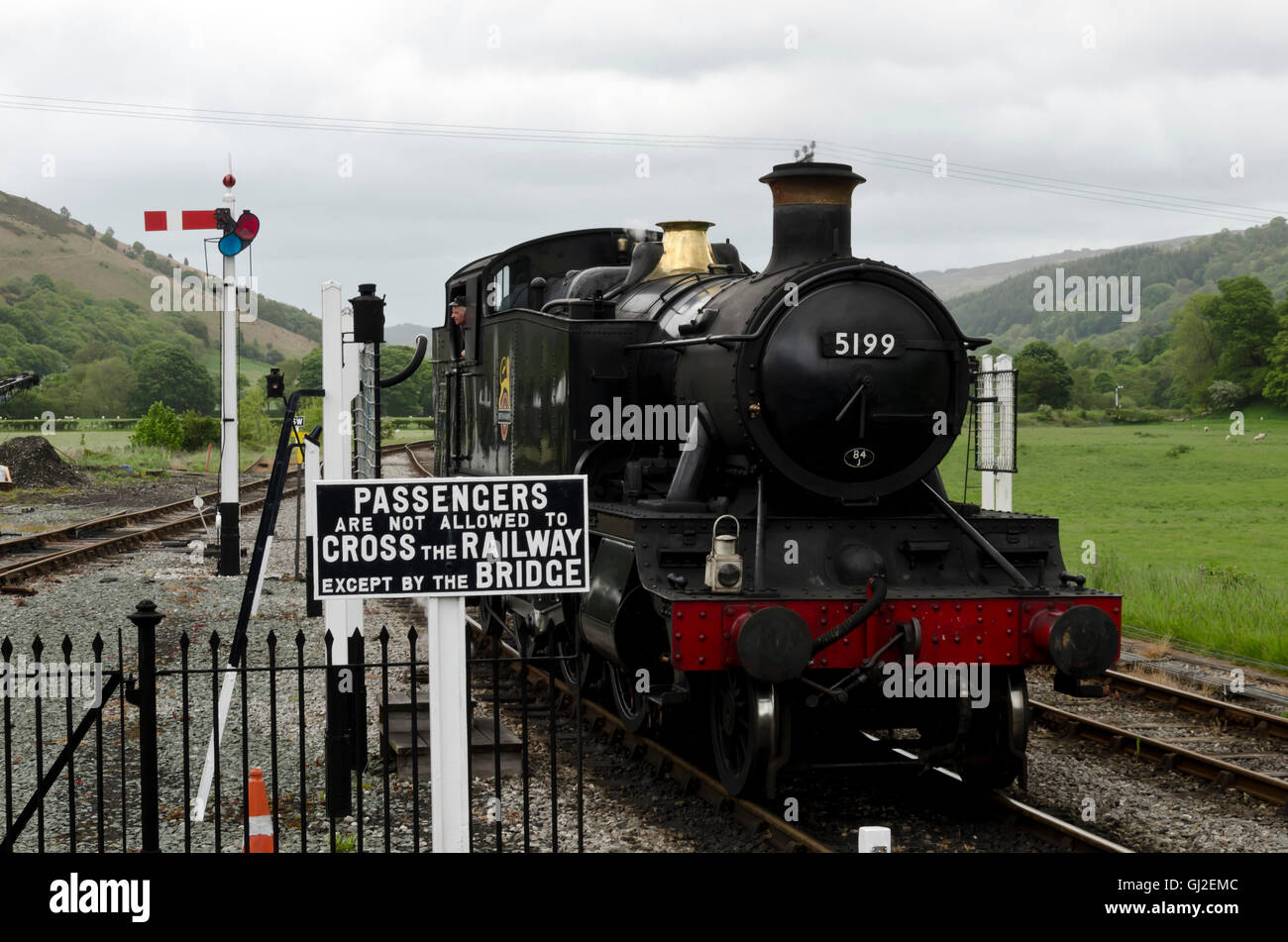 Steam tank locomotive approaching the train carriages at Carrog Station ...
