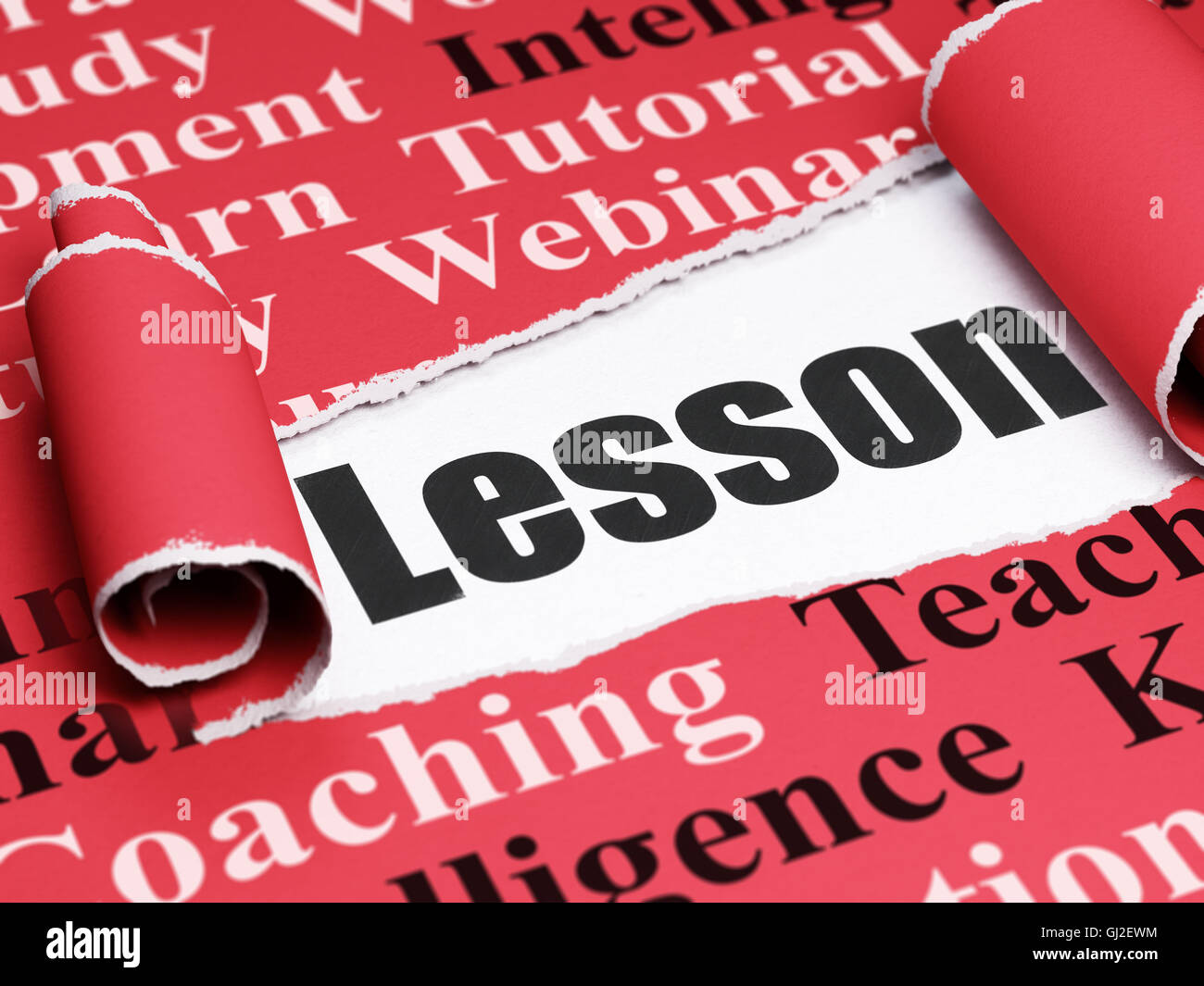 Learning concept: black text Lesson under the piece of torn paper Stock ...