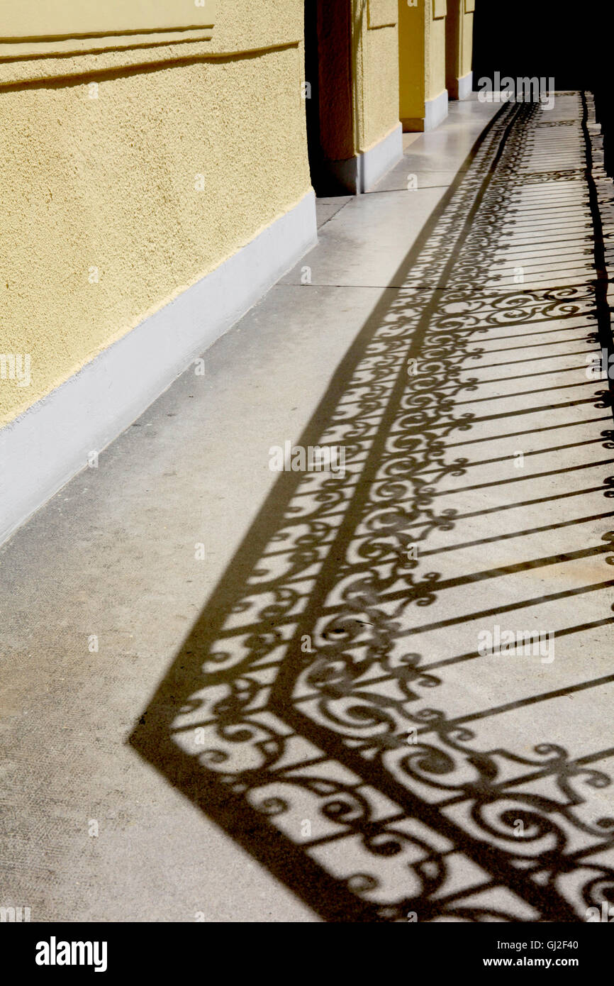 Beautiful iron railing design on the flooring shadow Stock Photo - Alamy