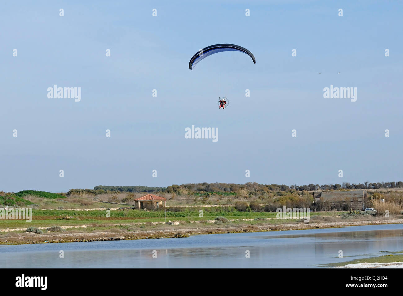 Paragliding over the Sinis, Mari Ermi Beach, Sardinia, Italy Stock ...