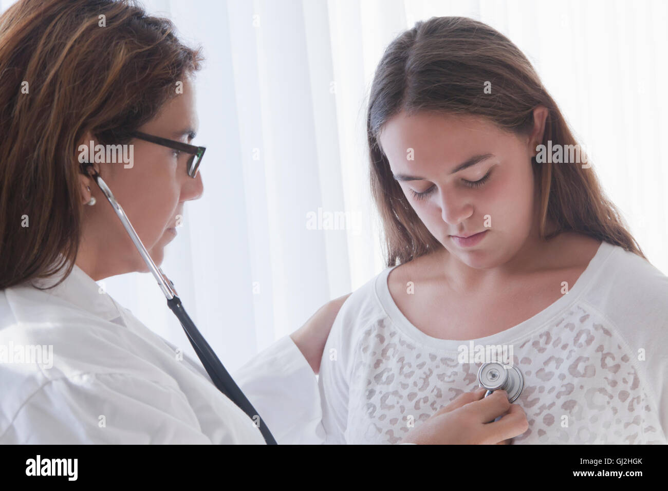 Examination stethoscope teenage hi-res stock photography and images - Alamy