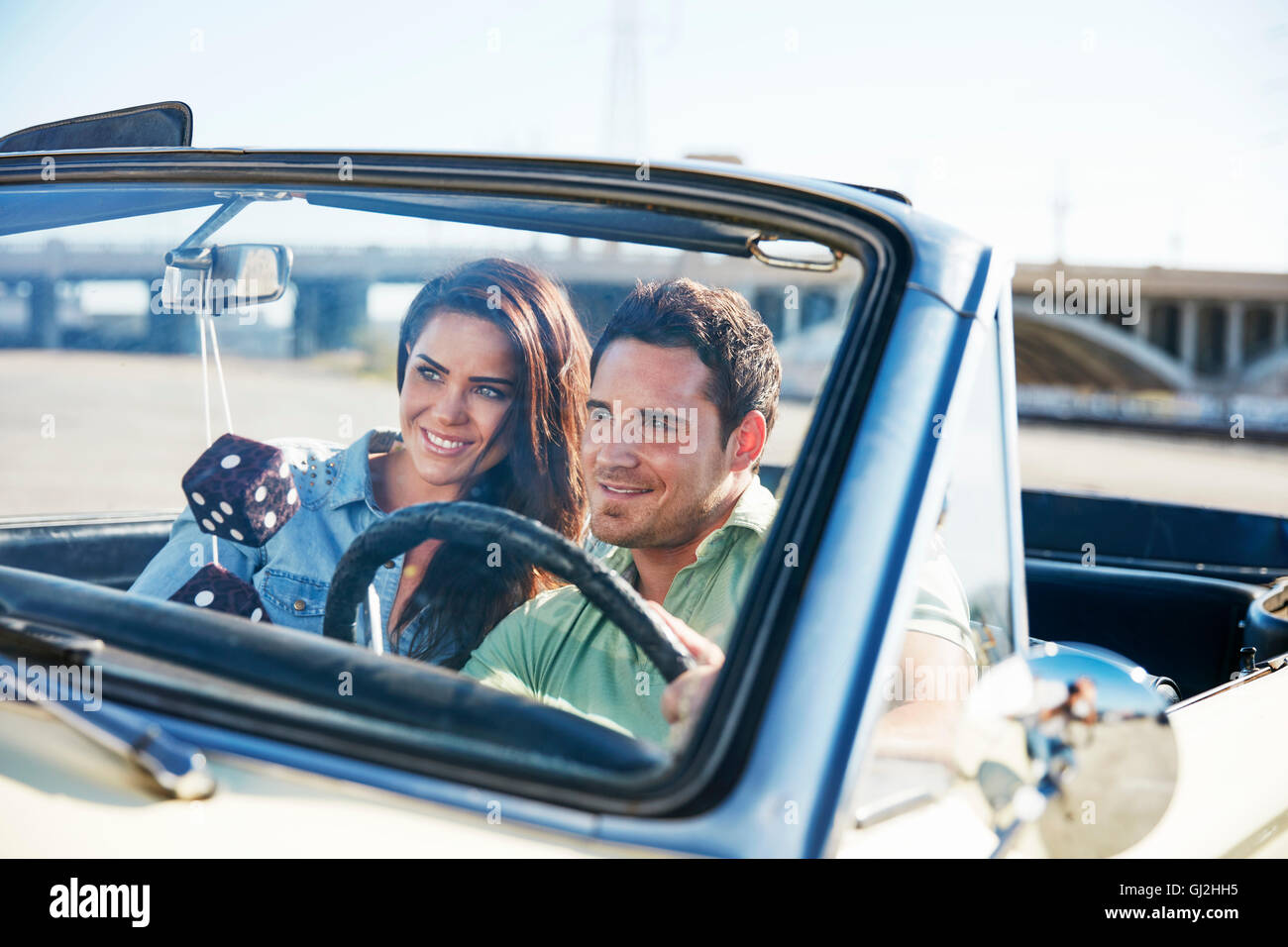 Couple in convertible car, Los Angeles, California, USA Stock Photo - Alamy