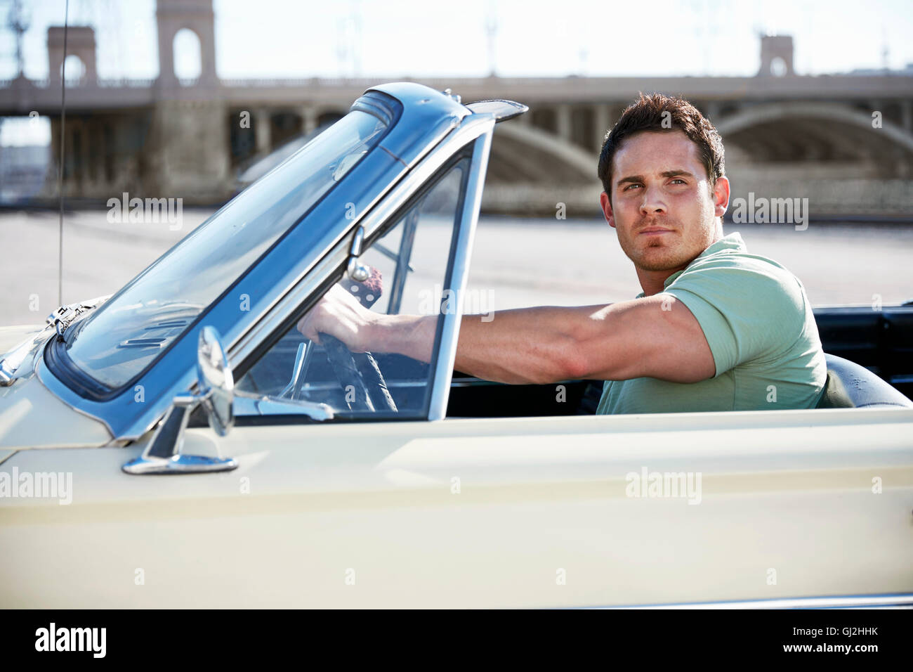 Man driving convertible car, Los Angeles, California, USA Stock Photo ...