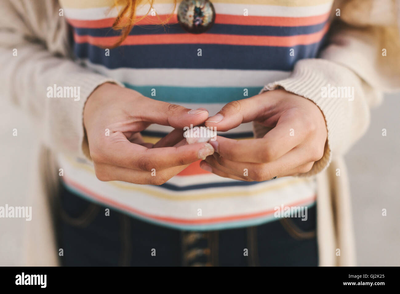 Woman holding seashell Stock Photo - Alamy