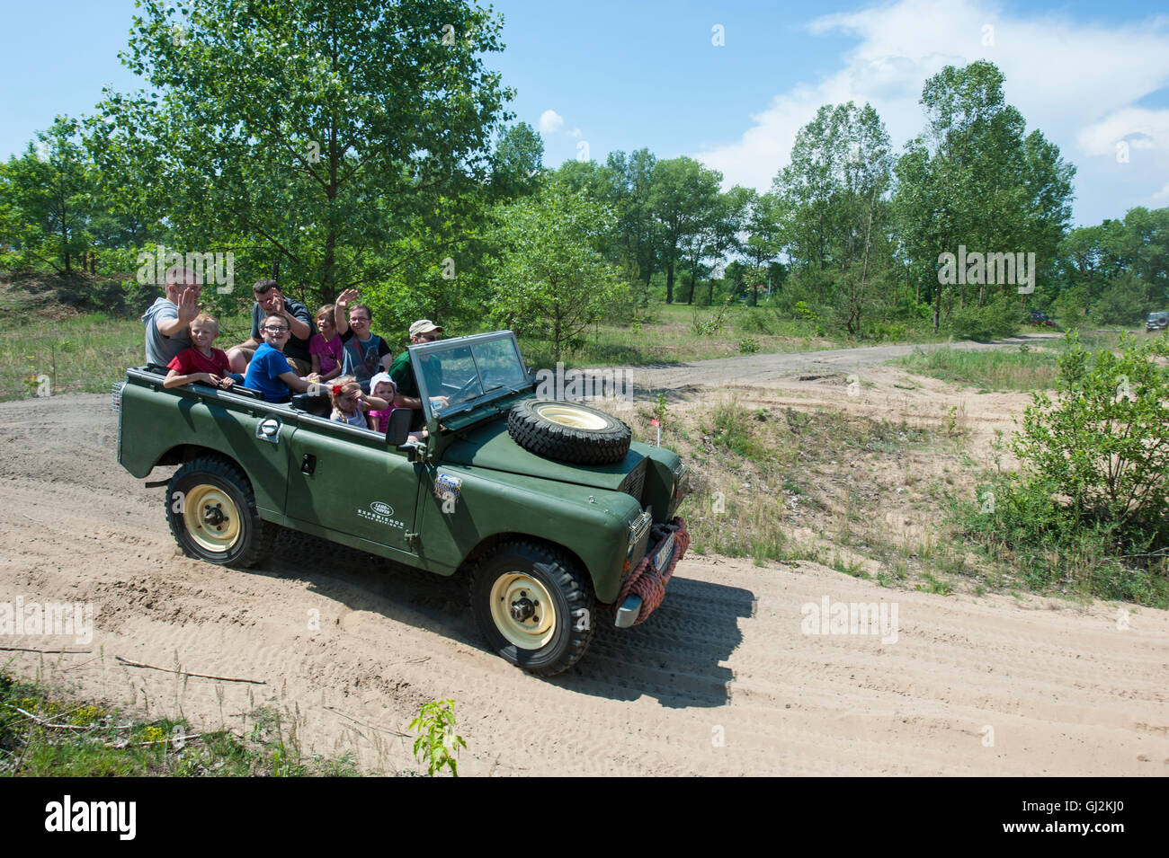 Off-road vehicles on display and in action during a summer public event ...