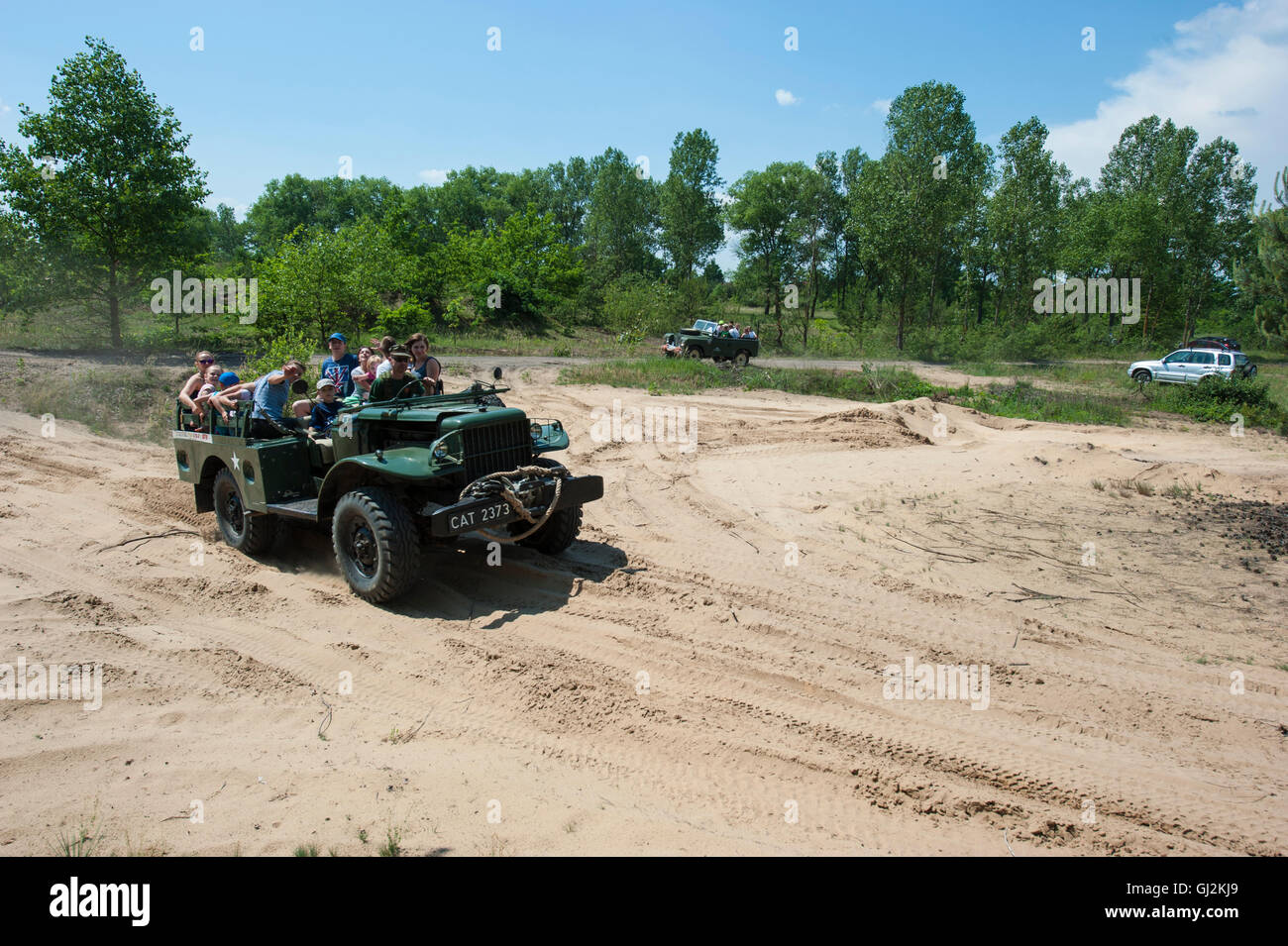 Off-road vehicles on display and in action during a summer public event ...