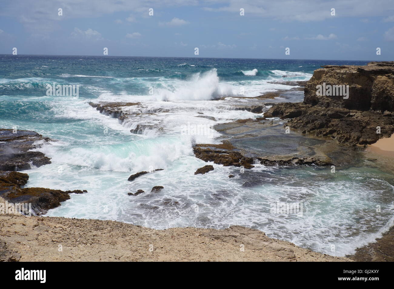 Crashing waves on Little Bay, Barbados Stock Photo - Alamy