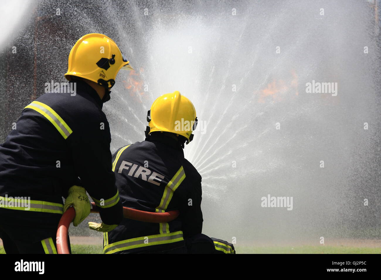 Water pattern formed by firefighters extinguishing a fire Stock Photo ...