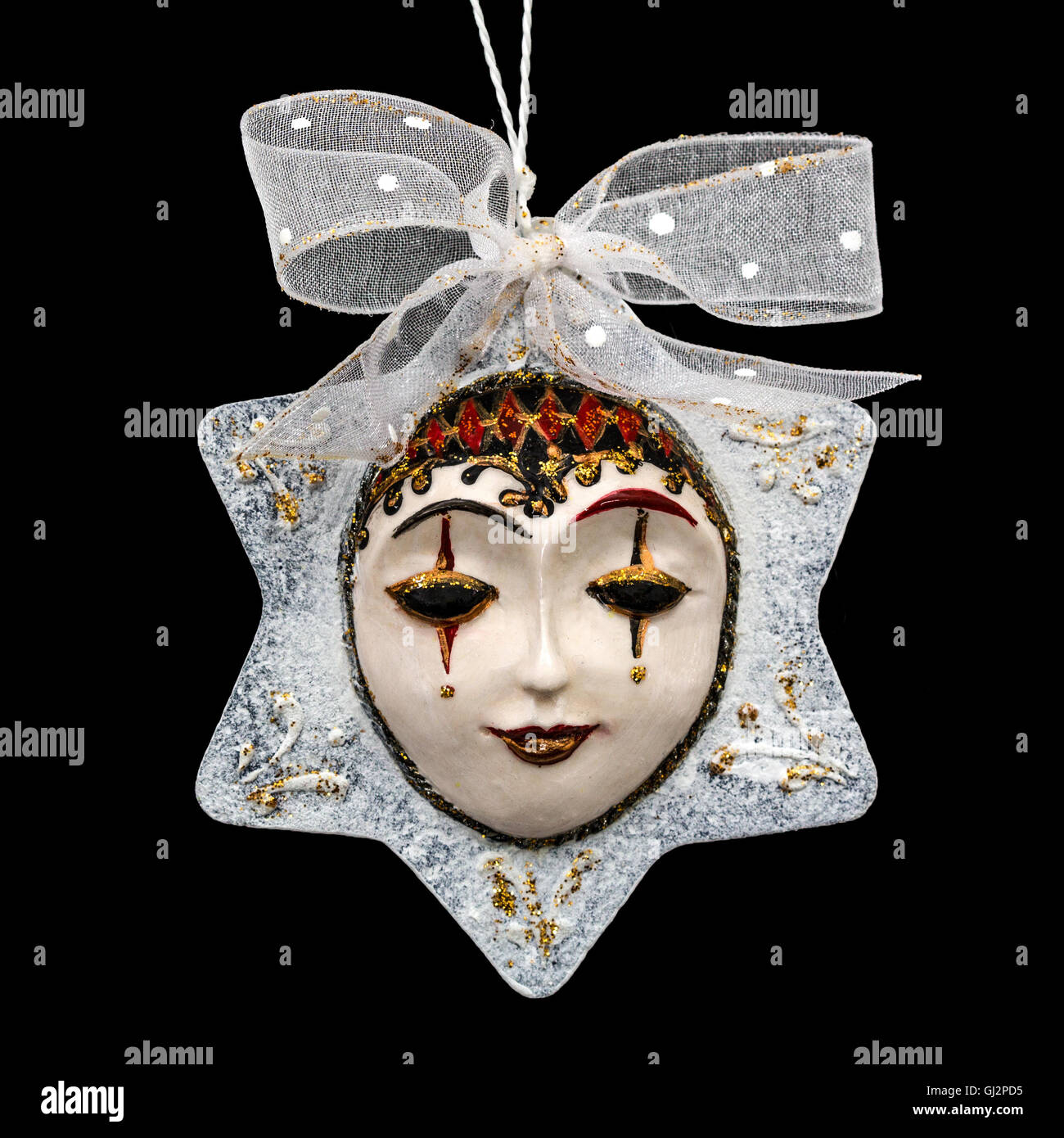 Beautiful mask of hand-worked for festive decoration, isolated on black ...