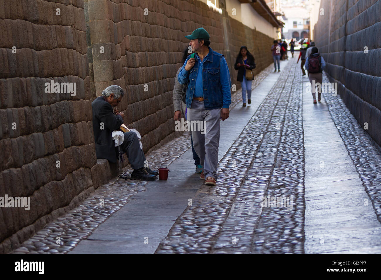 Cusco, Peru - May 14 : Native Peruvian playing a musical instrument in ...