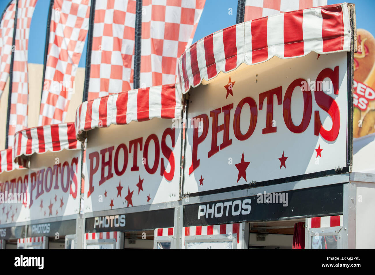Row of photo booth signs at the county fair Stock Photo - Alamy