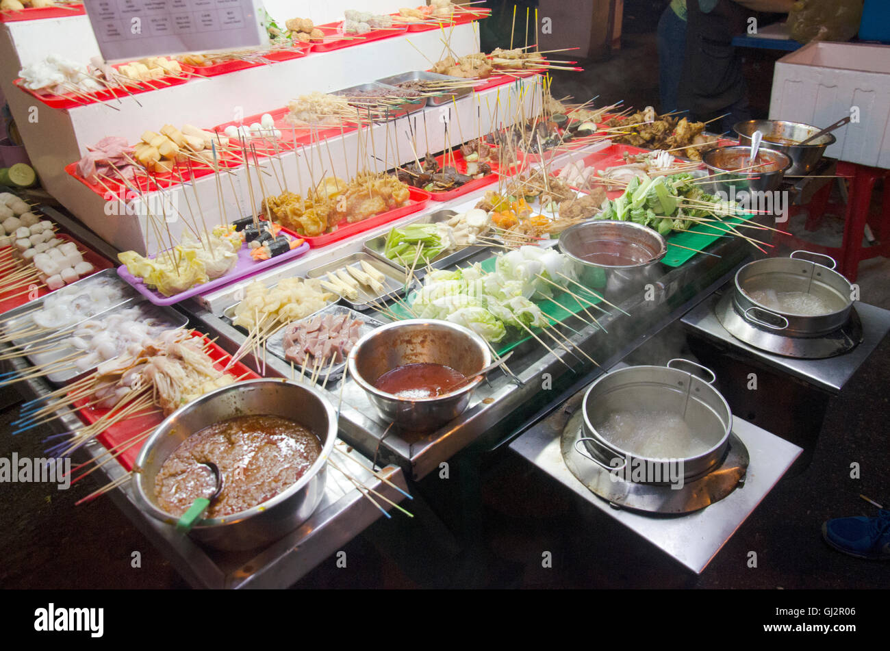 People buy and cook Lok Lok food malaysian style at restaurant in ...