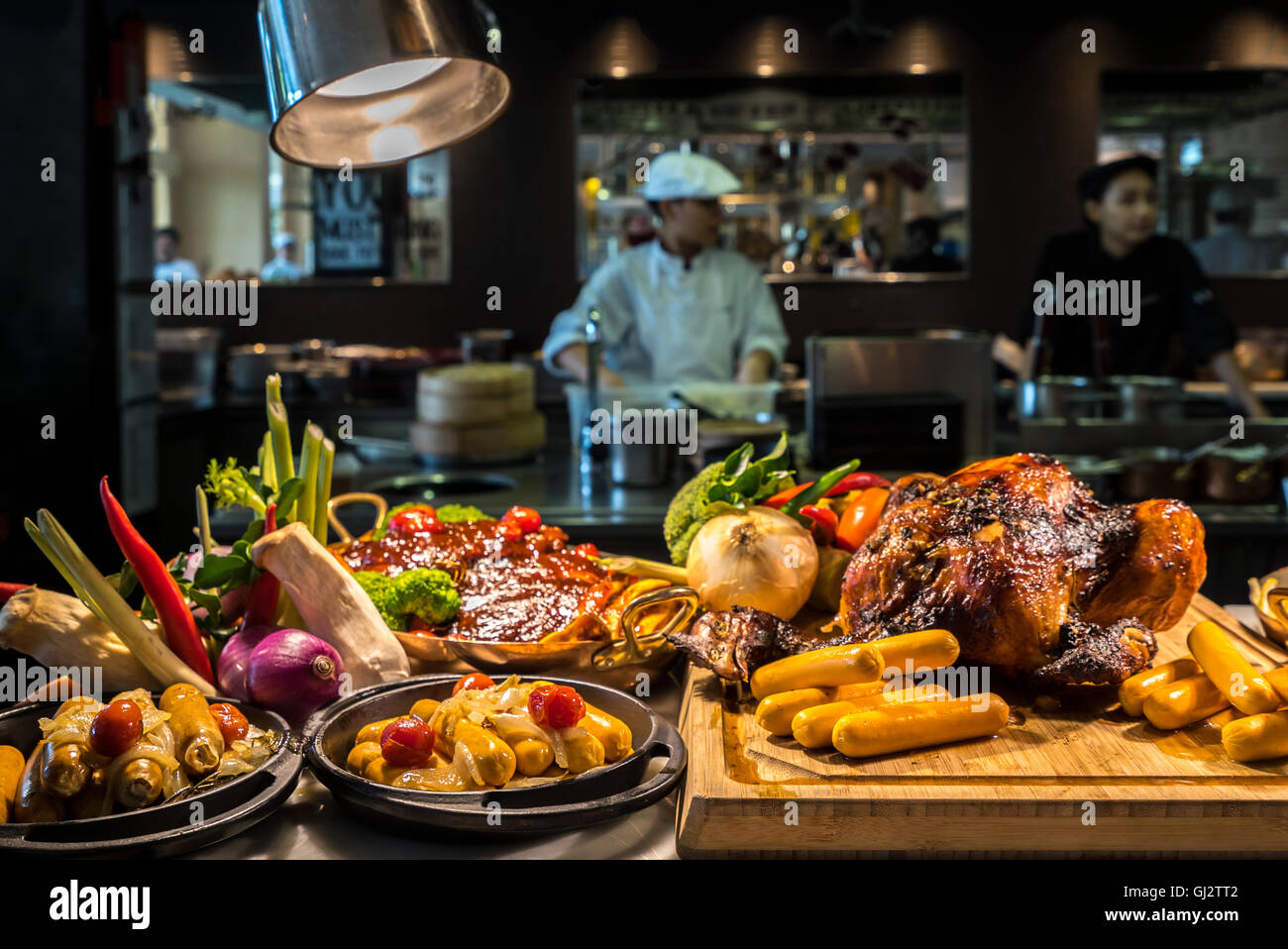 Food station with grilled carving food with kitchen working background ...