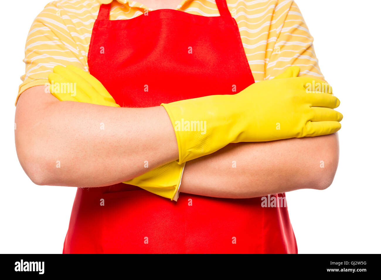 a man in a red apron ready to clean on a white background isolated ...