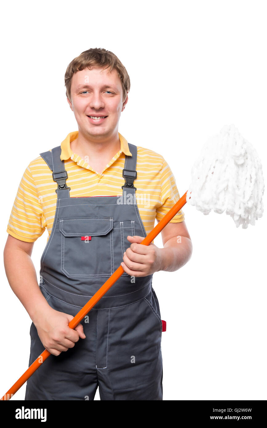 happy man in overalls holding a mop on a white background isolated ...