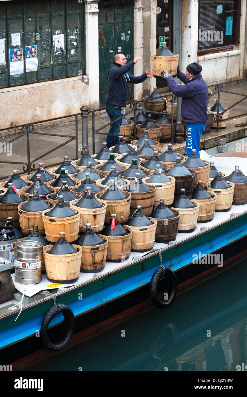 Transporting wine bottles in Venice Stock Photo - Alamy