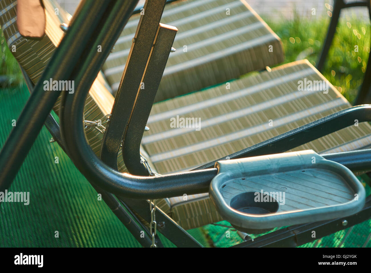Garden swing seat hi-res stock photography and images - Alamy
