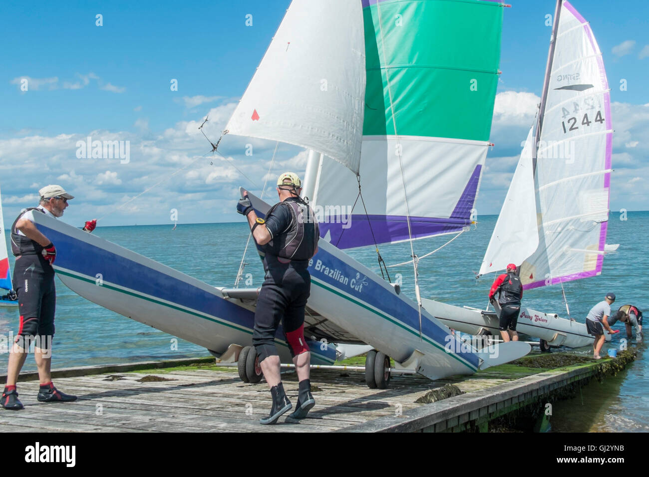 Pulling up a bucket hi-res stock photography and images - Alamy